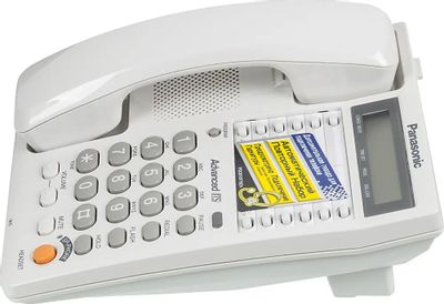 Проводной телефон Panasonic KX-TS2365RUW, белый – купить в Ситилинк | 18262